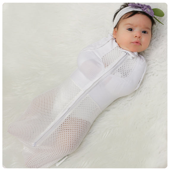 Woombie is the safest and most natural way to swaddle your baby